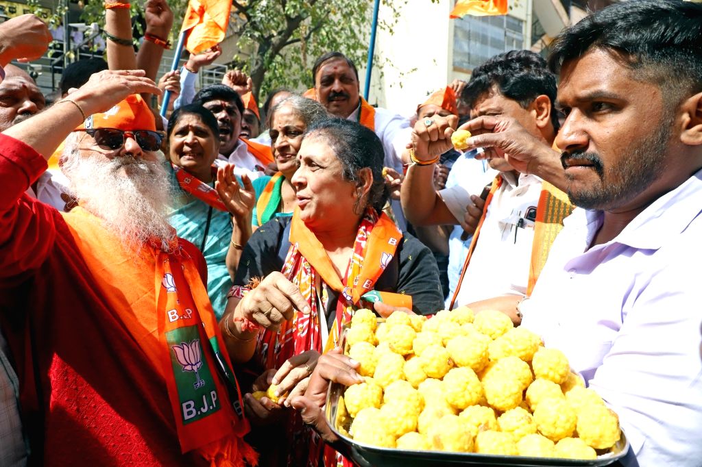 BJP workers celebrate party' victory in the Gujarat Assembly elections
