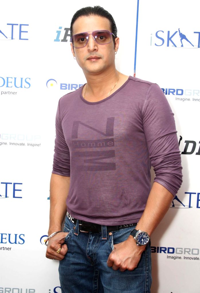 Jimmy Shergill and Neha Dhupia during a promotion Rangeelay