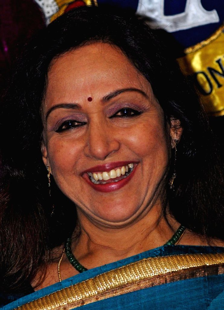 Bollywood actress Hema Malini arrives to attend a press conference for ...