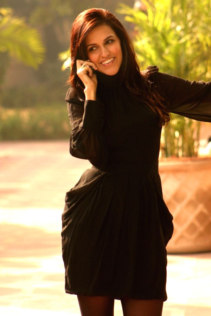 Bollywood actress Neha Dhupia in New Delhi on Teusday to promote her ...