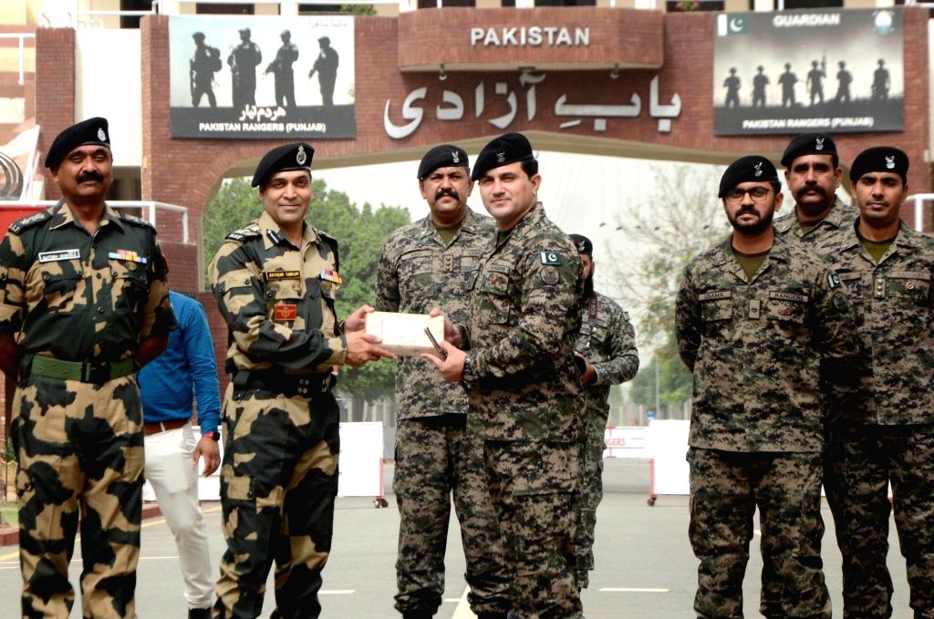 Border Security Force (BSF) and Pakistan Rangers exchange sweets on the ...