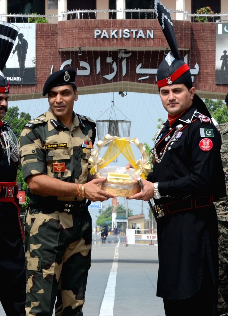 BSF and Pakistan Rangers exchange sweets on the occasion of ...