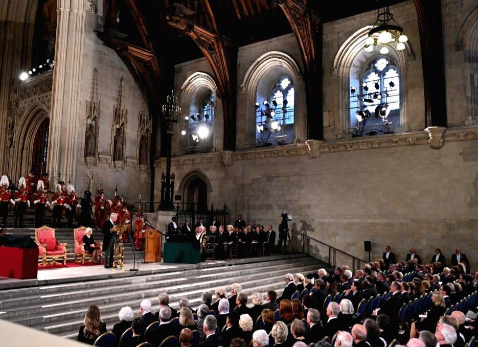 Britain's King Charles III (C) delivers his first address to the ...