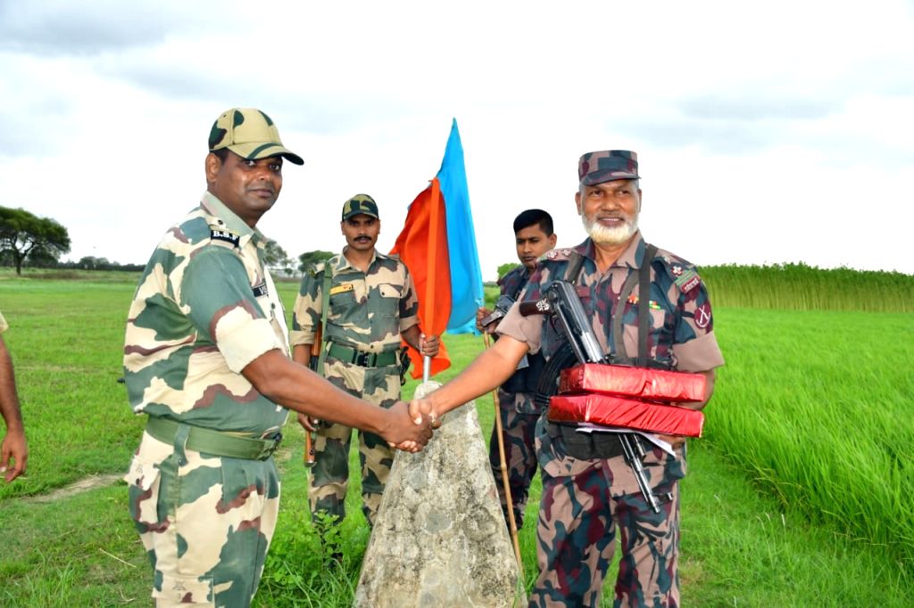 Free Photo : BSF and Border Guard Bangladesh exchange sweets on India's ...