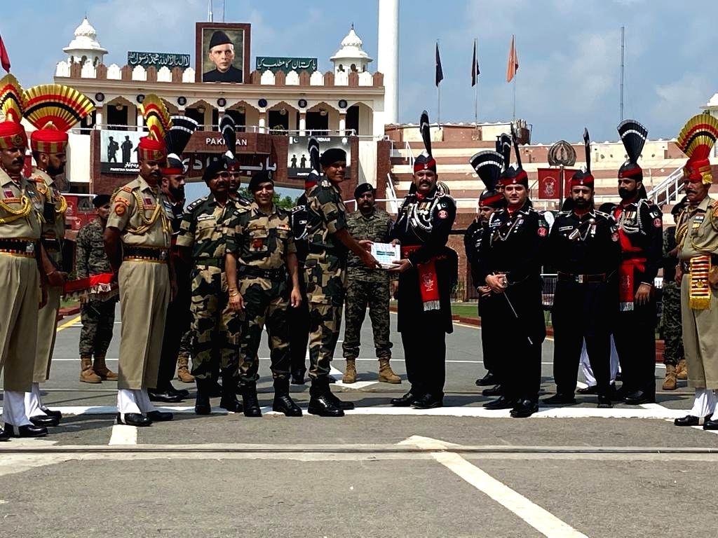 Free Photo :BSF and Pakistan Rangers exchange sweets on Pakistan's ...