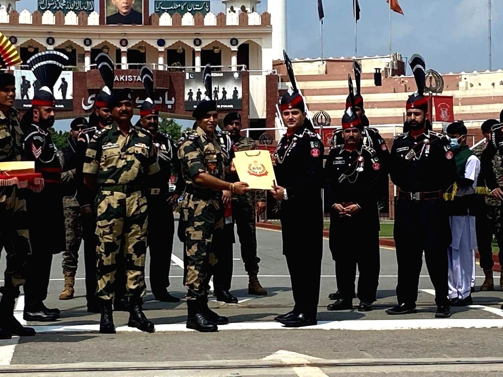 Free Photo :BSF and Pakistan Rangers exchange sweets on Pakistan's ...