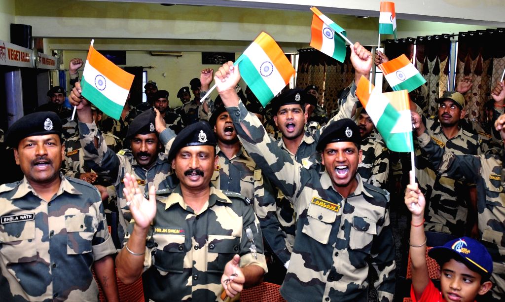 BSF personnel watch India Vs Pakistan match