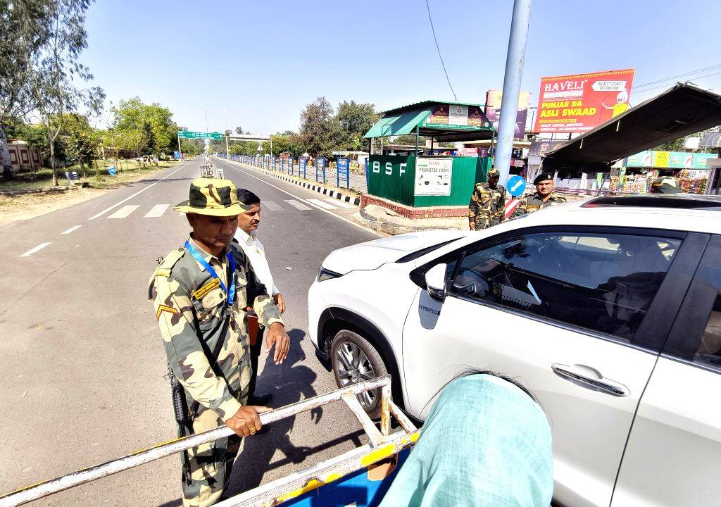 BSF soldiers stand guard at Wagah border