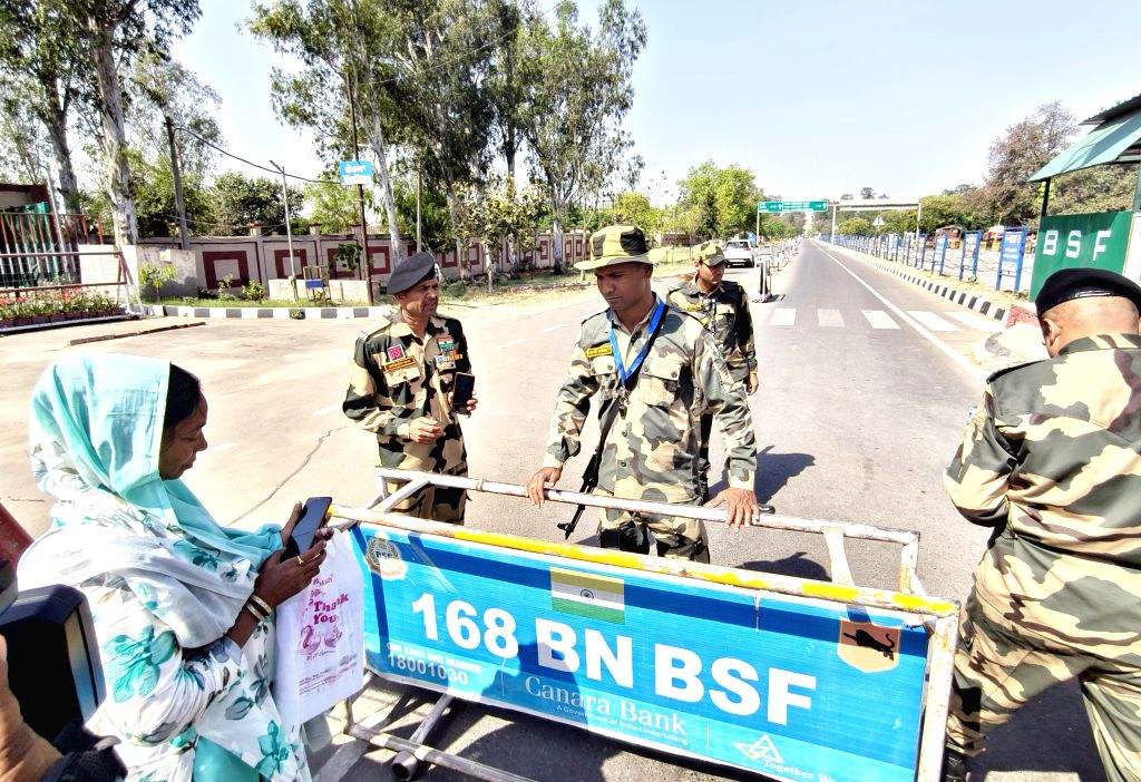 BSF soldiers stand guard at Wagah border