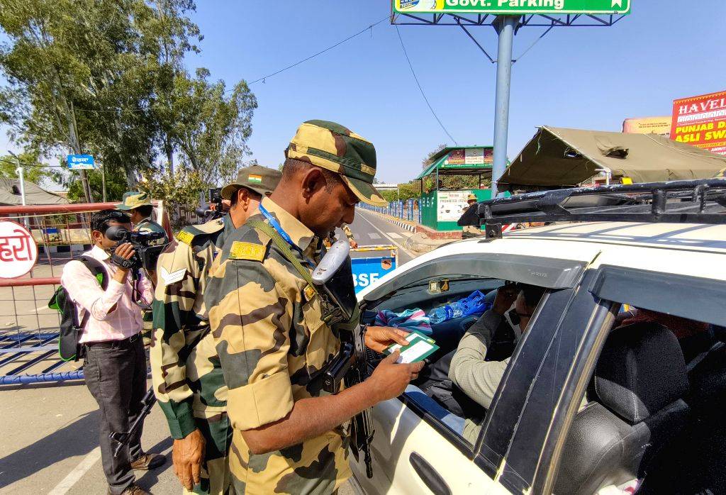 BSF soldiers stand guard at Wagah border