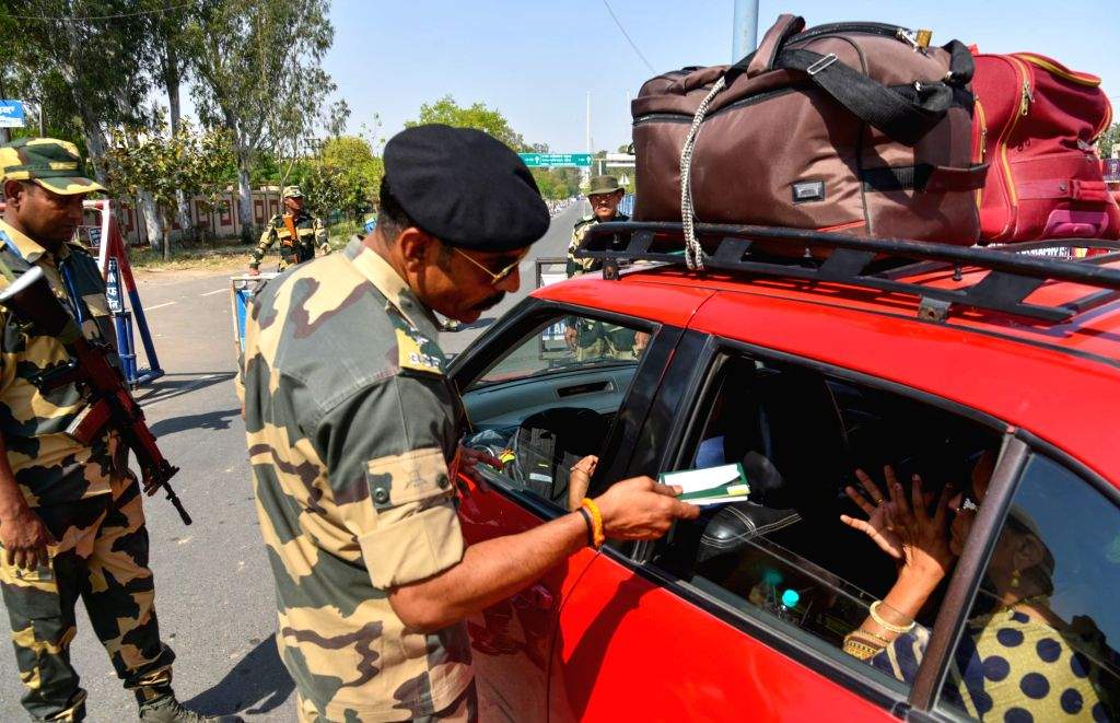 BSF soldiers stand guard at Wagah border