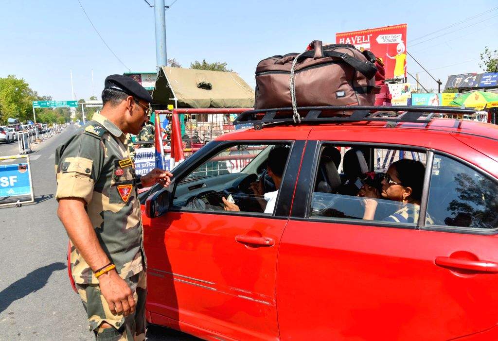 BSF soldiers stand guard at Wagah border