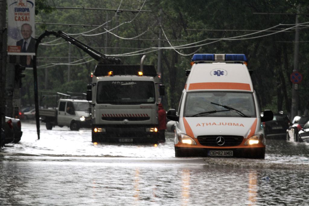 A street is flooded after a thunder storm and hail hit Bucharest