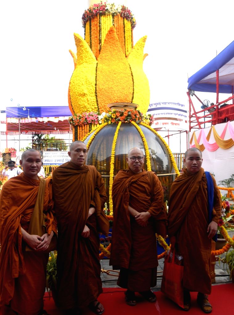 Buddhist monks at the decorated Chaitya Bhoomi