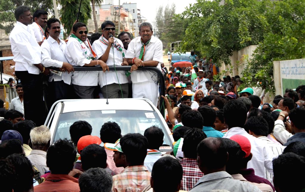 Congress Candidate Byrathi Basavaraju campaigning