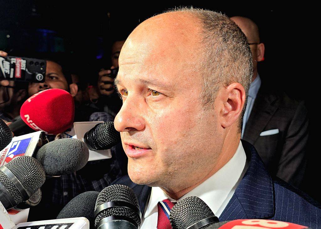Canada's Deputy High Commissioner Stewart Wheeler speaks to the media