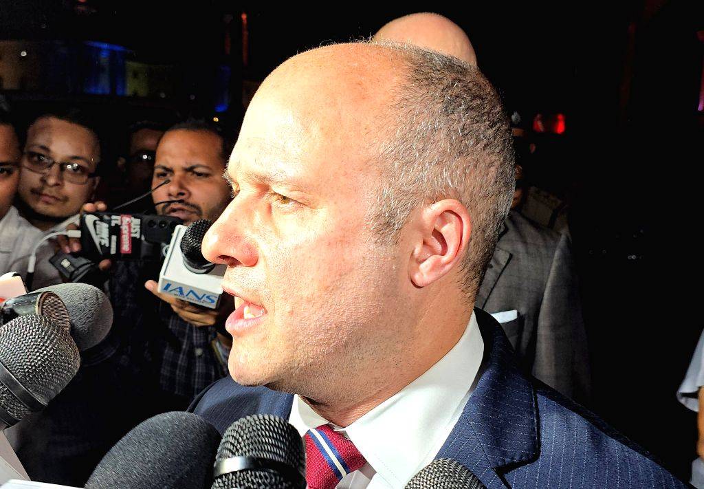 Canada's Deputy High Commissioner Stewart Wheeler speaks to the media
