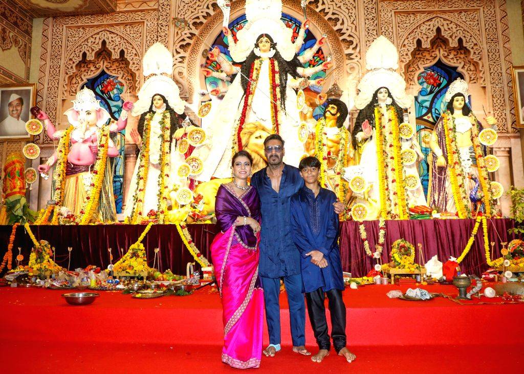 Celebrities visit a pandal during the Durga Puja festival