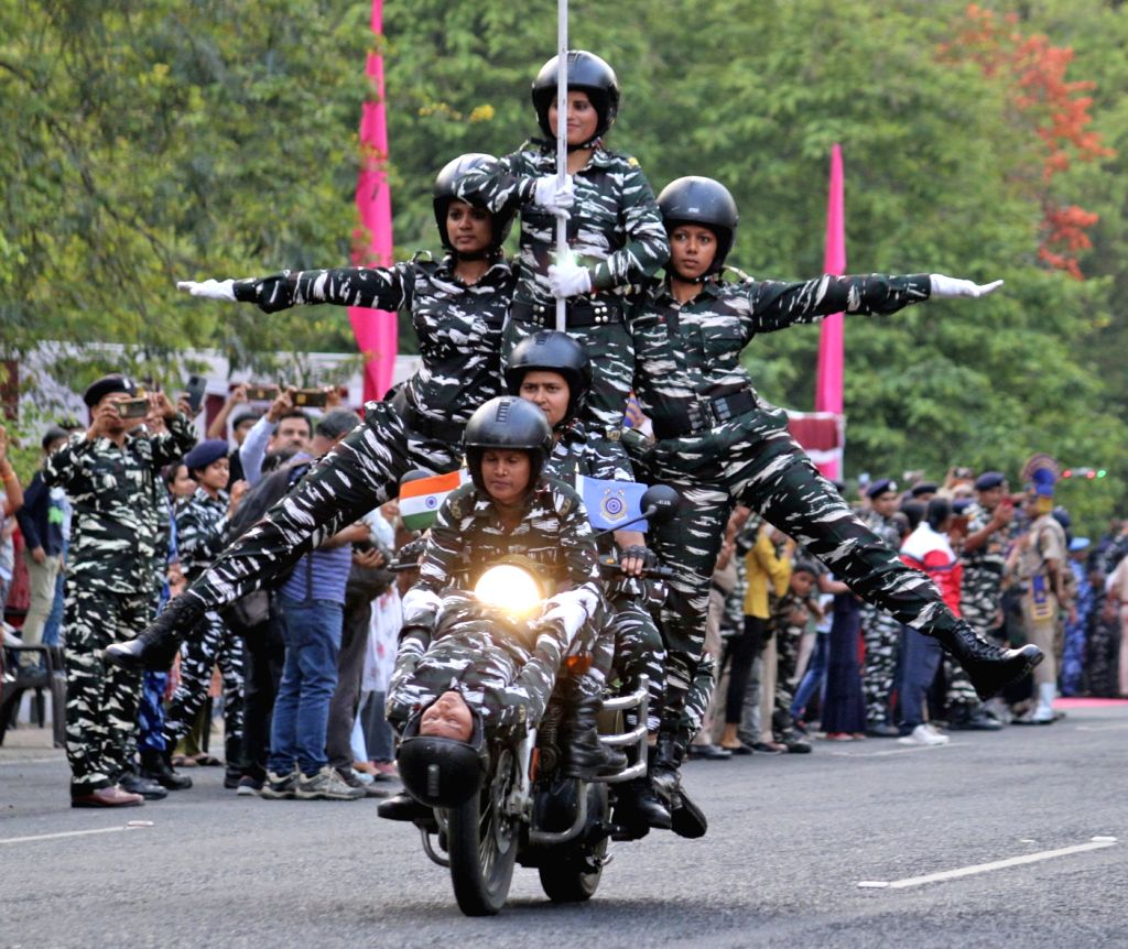 : Bhopal : CRPF women perform in a daredevil show during women bikers rally