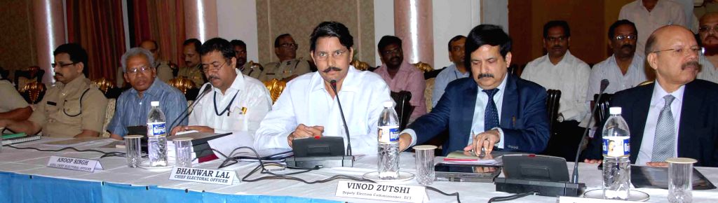 A review meeting with state district collectors and police department