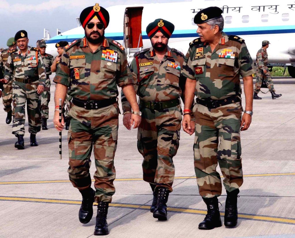 Bikram Singh with the Anil Chait on his arrival at Gauchar