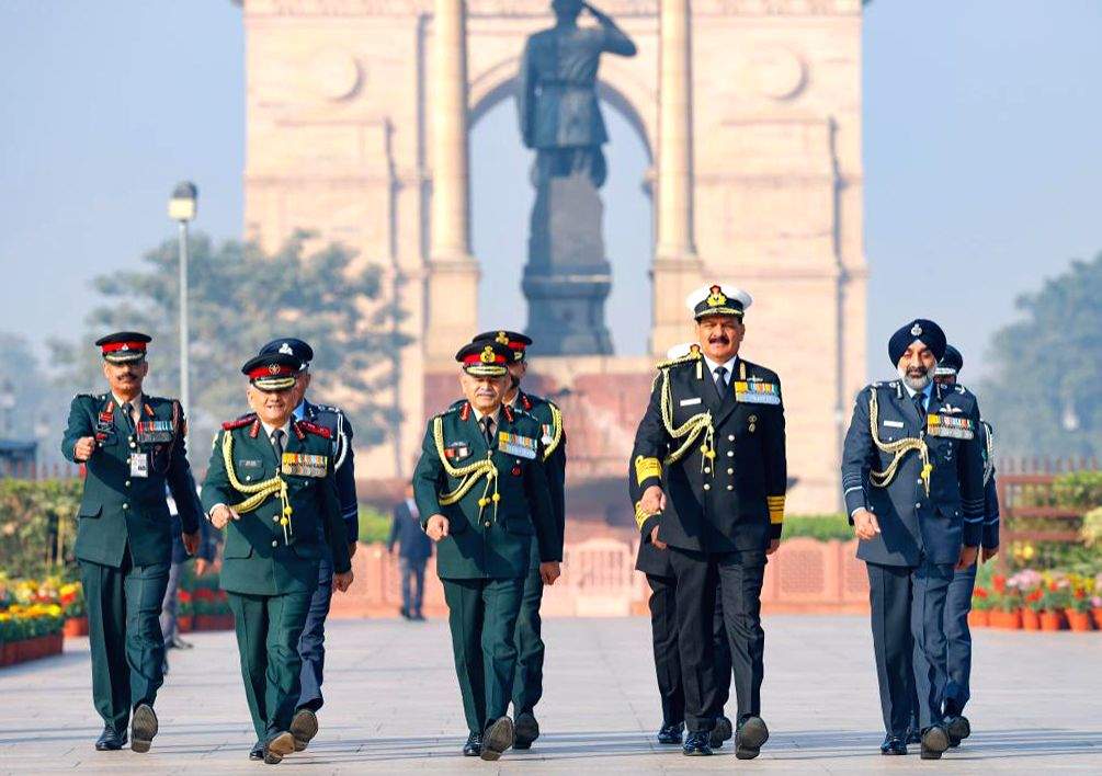 Chief of Defence Staff General Anil Chauhan, accompanied by the three ...