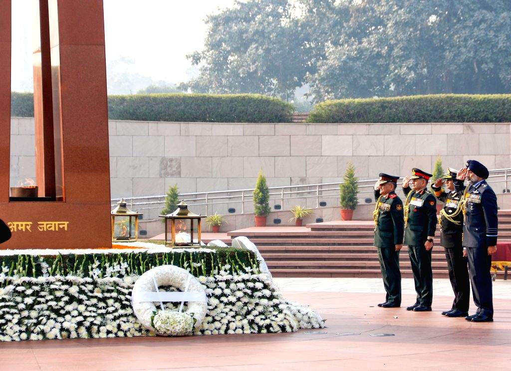 Chief of Defence Staff General Anil Chauhan, accompanied by the three ...
