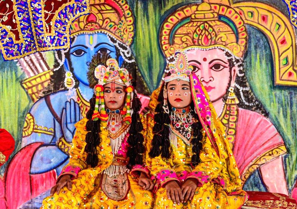 Child artists dressed as Lord Ram and Sita take part in a performance ...