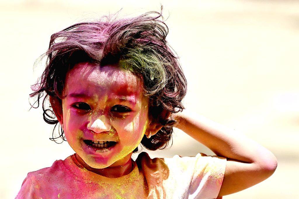 Children celebrate Holi