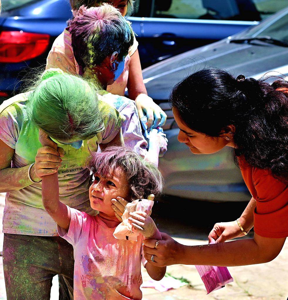 Children celebrate Holi
