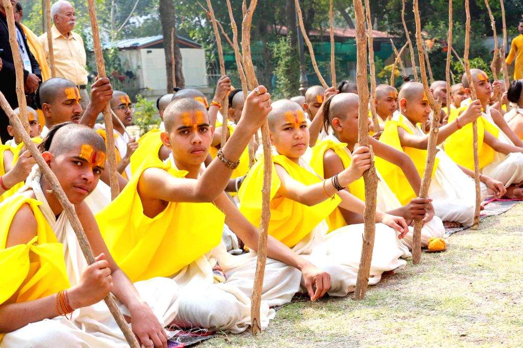 Children take part in rituals on the occasion of the 'Saraswati Puja ...