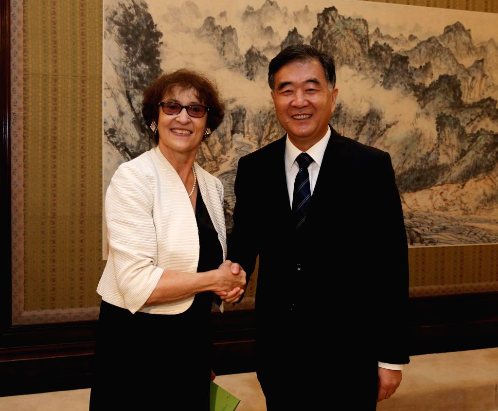 CHINA-BEIJING-WANG YANG-CAROLINE ATKINSON-MEETING