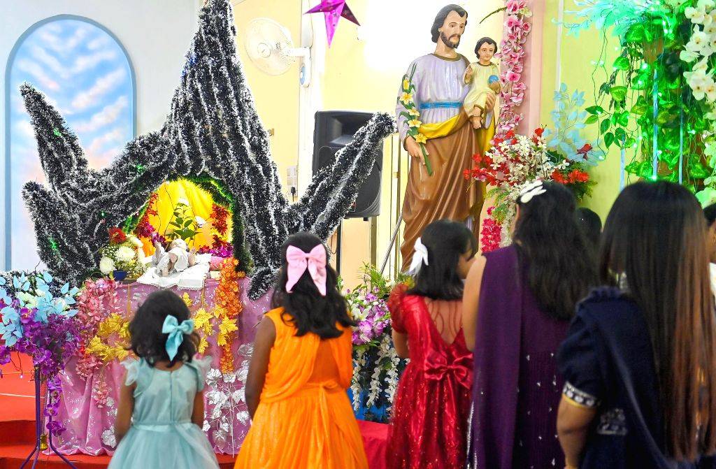 Christian devotees attend a prayer at Mariam Nagar Church on the ...