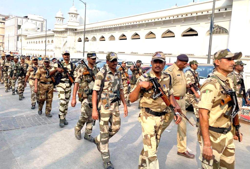 CISF personnel during a route march at Russel market ahead of Lok Sabha ...