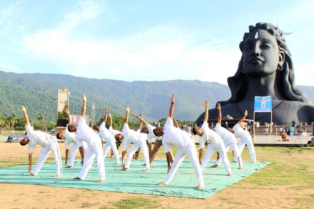 CISF personnel of Coimbatore Airport perform yoga sessionat Isha Yoga ...