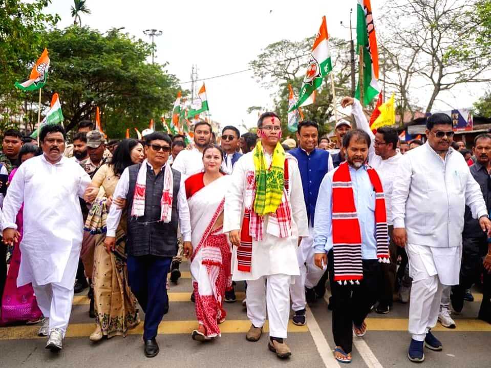 Congress leader Gaurav Gogoi acknowledges supporters during a ...