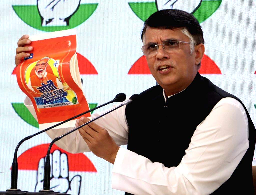 Congress leader Pawan Khera addresses a press conference at AICC office