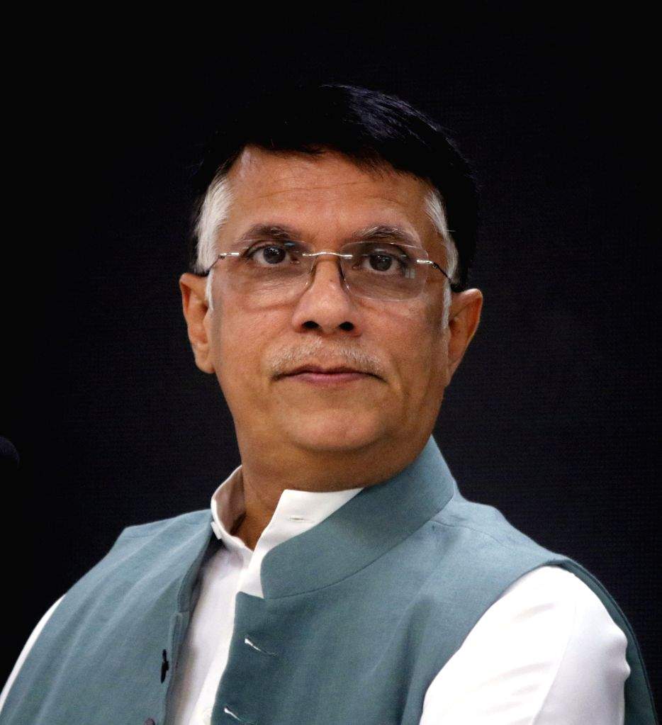 Congress leader Pawan Khera addresses a press conference