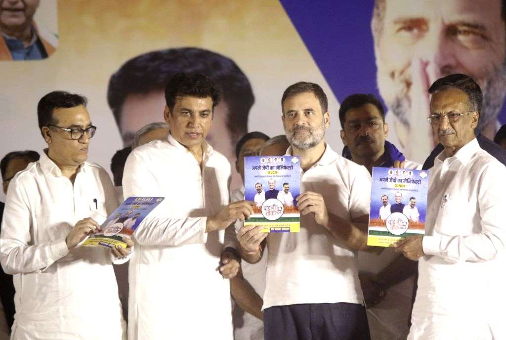 Congress leader Rahul Gandhi attends an election rally at Ramleela ground