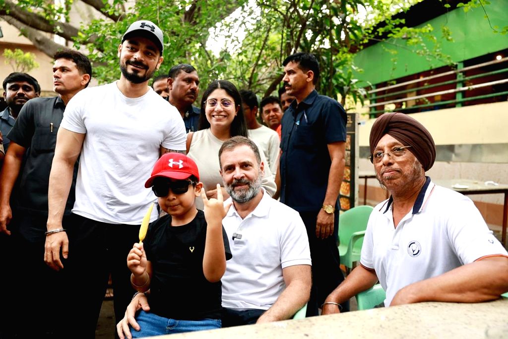 Congress leader Rahul Gandhi interacts with people at a restaurant in ...