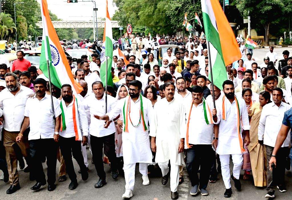 Congress leaders participate in the party's padayatra to mark the first ...