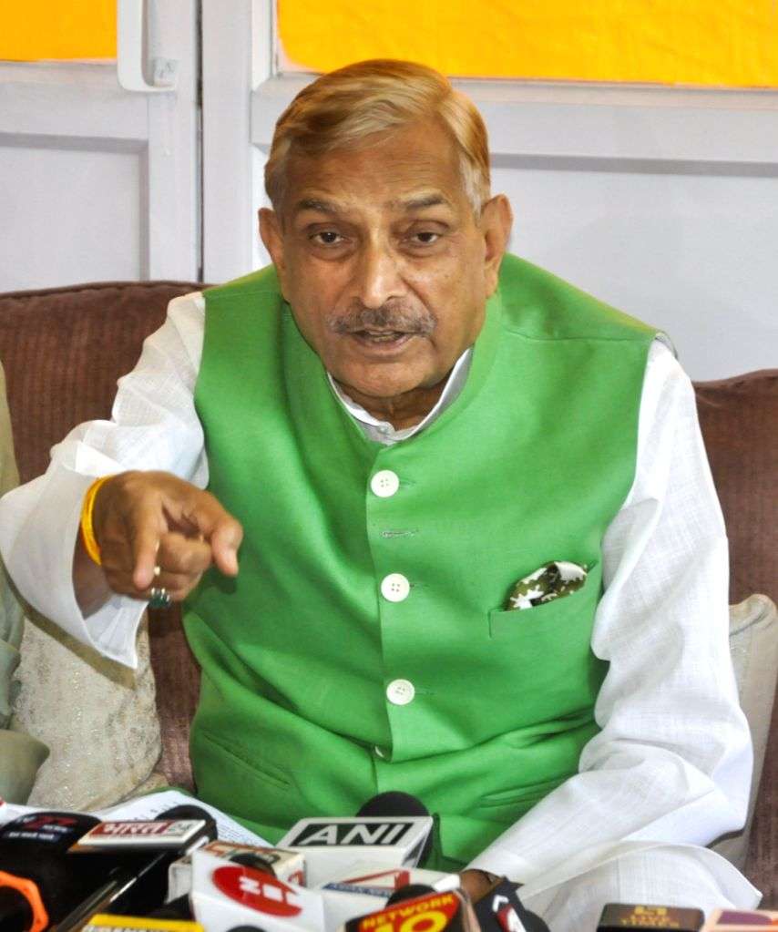 Congress MP Pramod Tiwari addresses press
