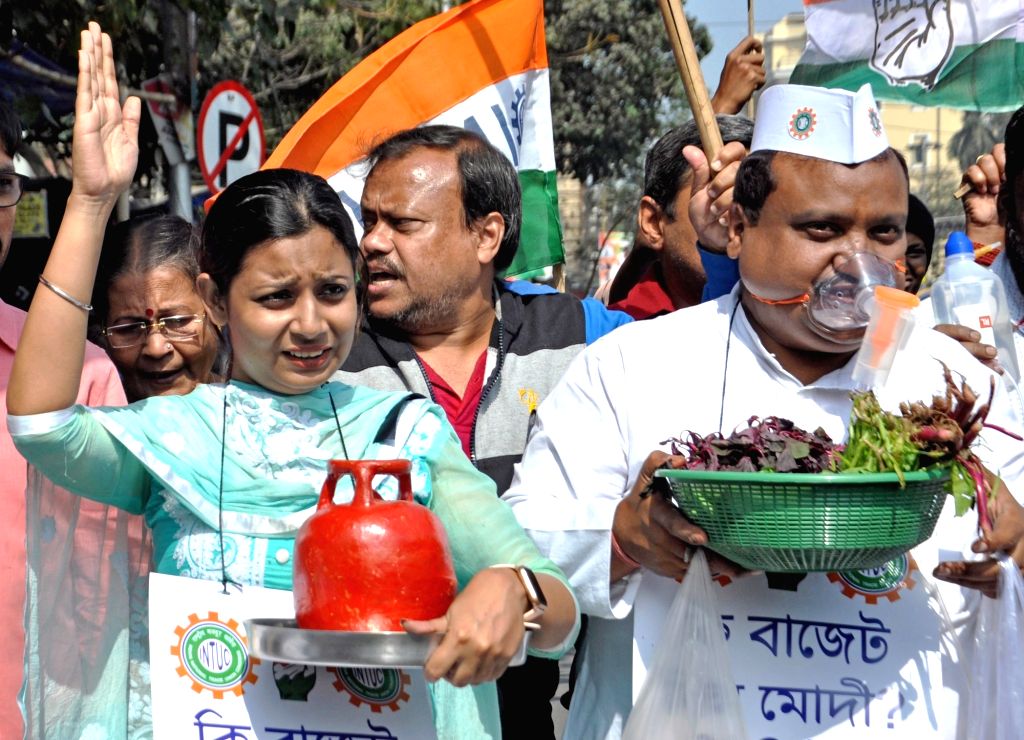 Congress Party activists carrying food grains, vegetables and medical ...