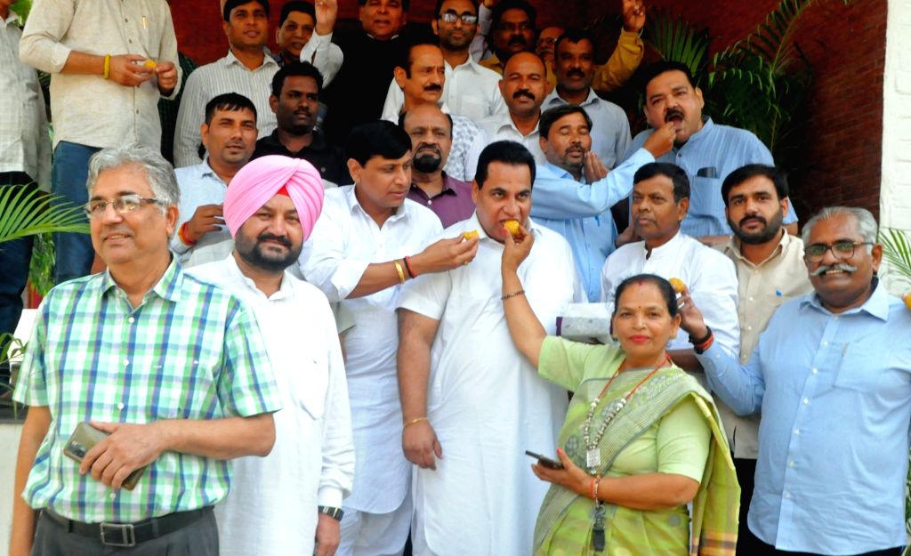 Congress party workers celebrate as Mallikarjun Kharge elected as party ...