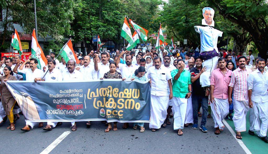 Congress party workers stage a protest