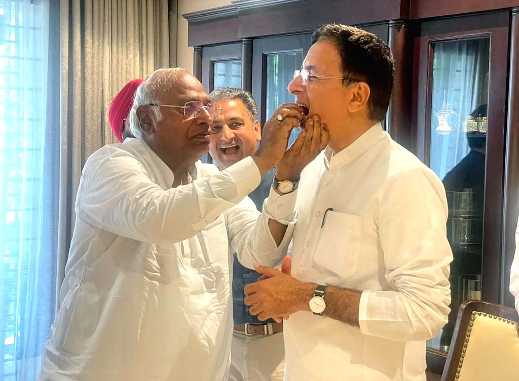 Congress President Mallikarjun Kharge with senior party leader Randeep ...