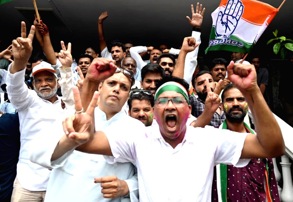 Bengaluru : Congress workers celebrate at the party office after the ...