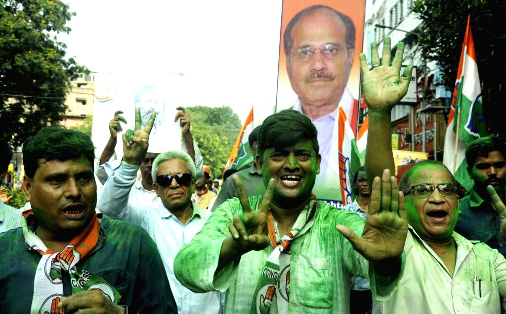 Kolkata: Congress workers celebrate after the party's decisive lead in ...