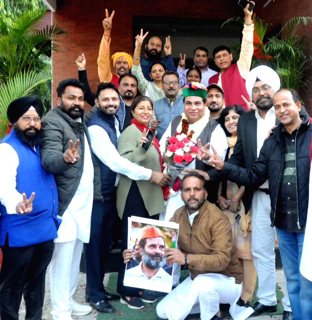 Congress workers celebrate party's victory in Himachal assembly elections