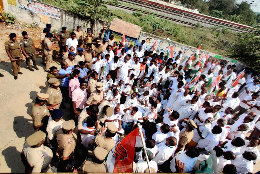 Congress workers during a rail roko protest over party leader Rahul ...